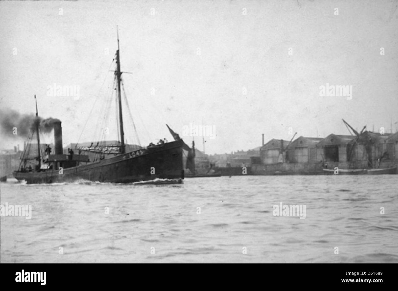 This photograph depicts the SS 'Malvina', a ship on the River Thames ...