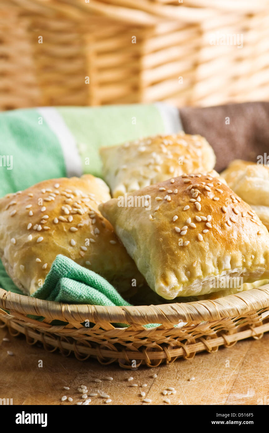 three baking bun on plate closeup Stock Photo - Alamy