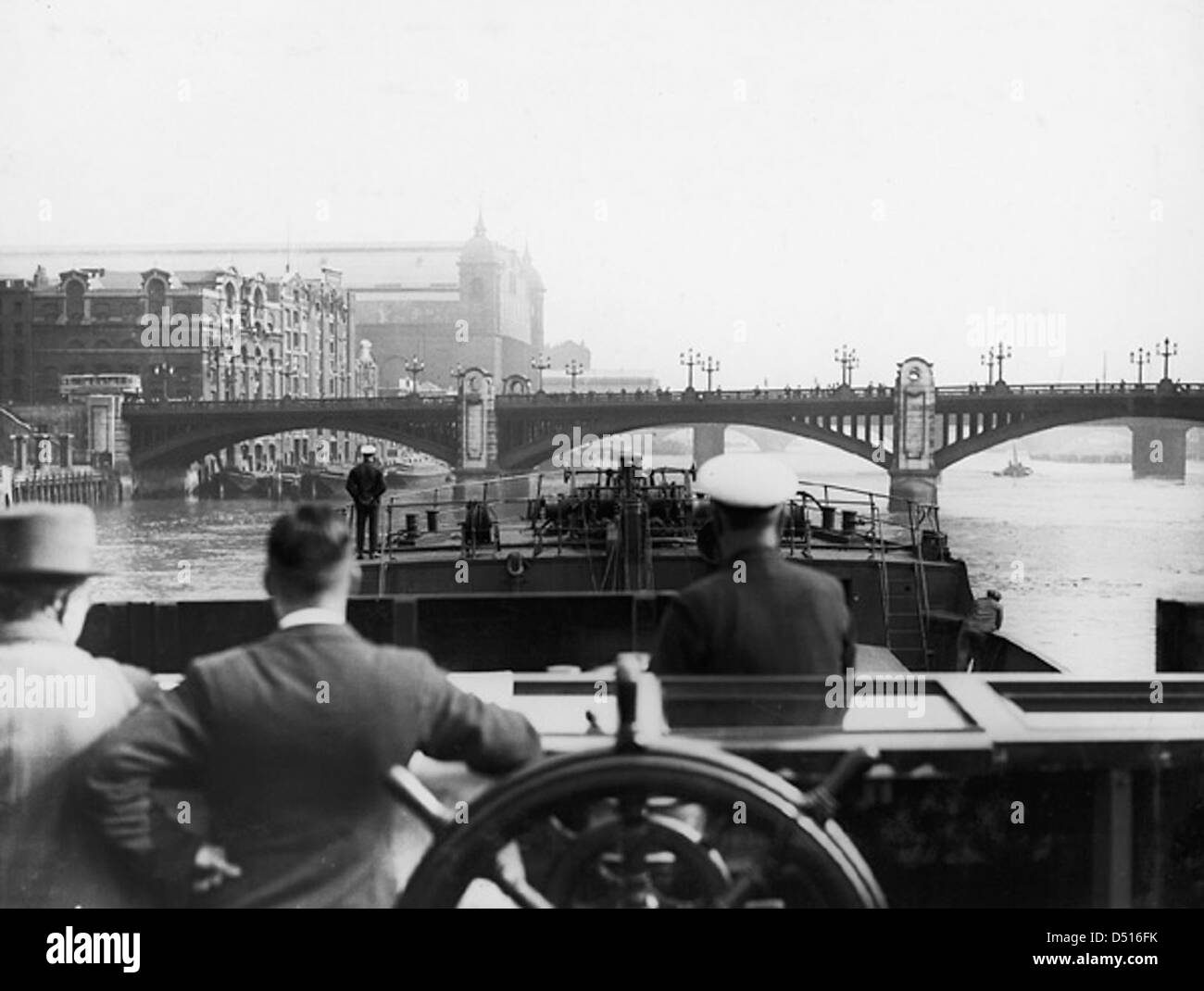 The SS 'Ewell' is captured approaching Southwark Bridge, London, in ...