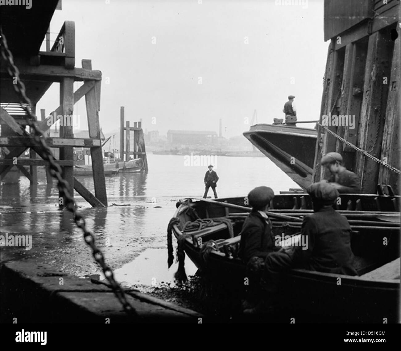 A historical photograph of a commercial dock pier in London, featuring ...