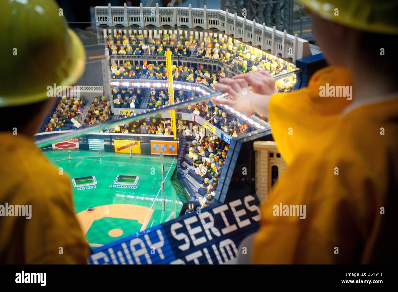 Yonkers, New York, U.S. March 21, 2013. Children look over the LEGO ...