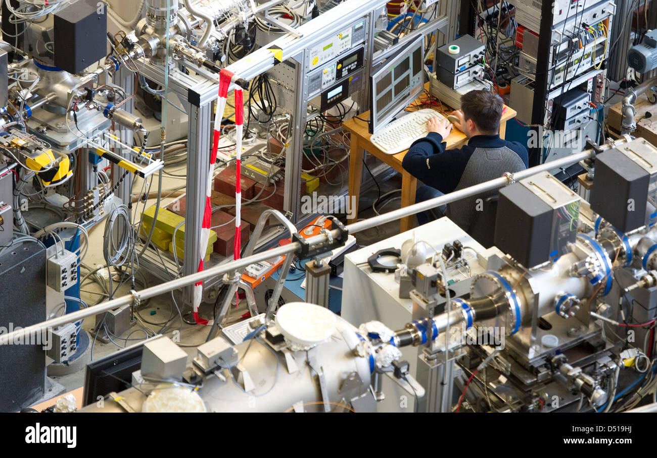 A scientist works in the experiment facility of the free electron laser ...