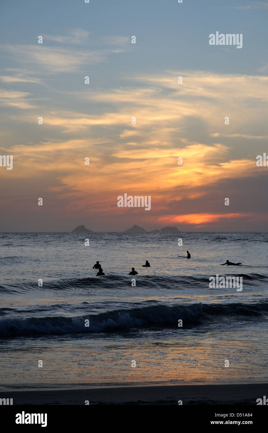 Surfers at Susnet at Ipanema Beach Stock Photo - Alamy