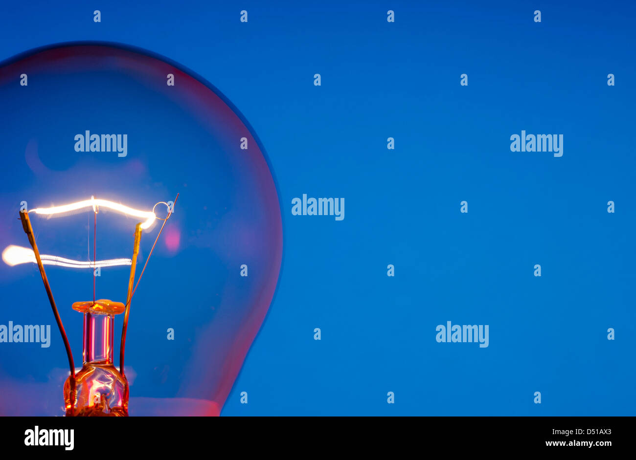Light bulb with blue background hi-res stock photography and images - Alamy