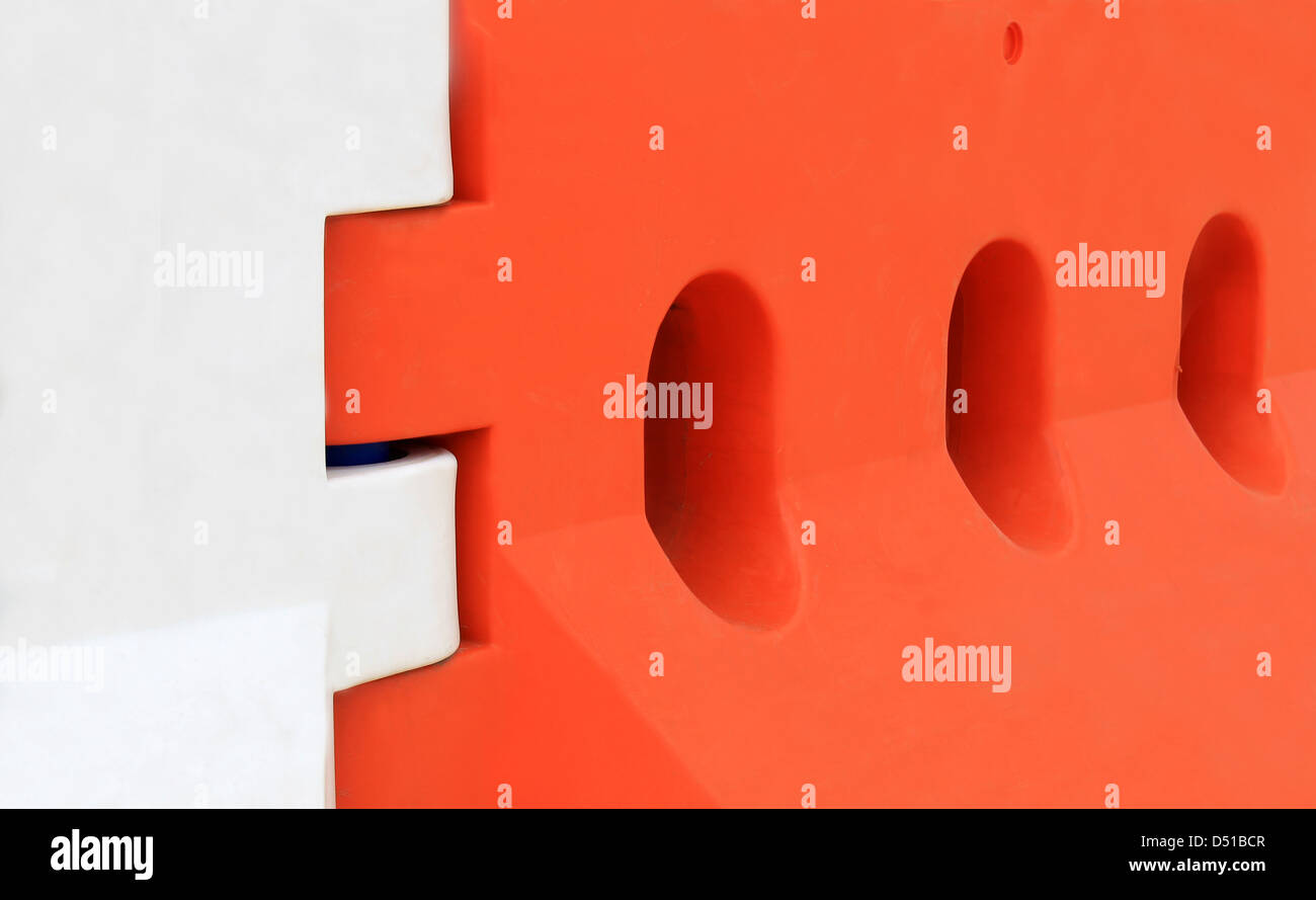 Plastic crash barrier used in the construction industry Stock Photo - Alamy