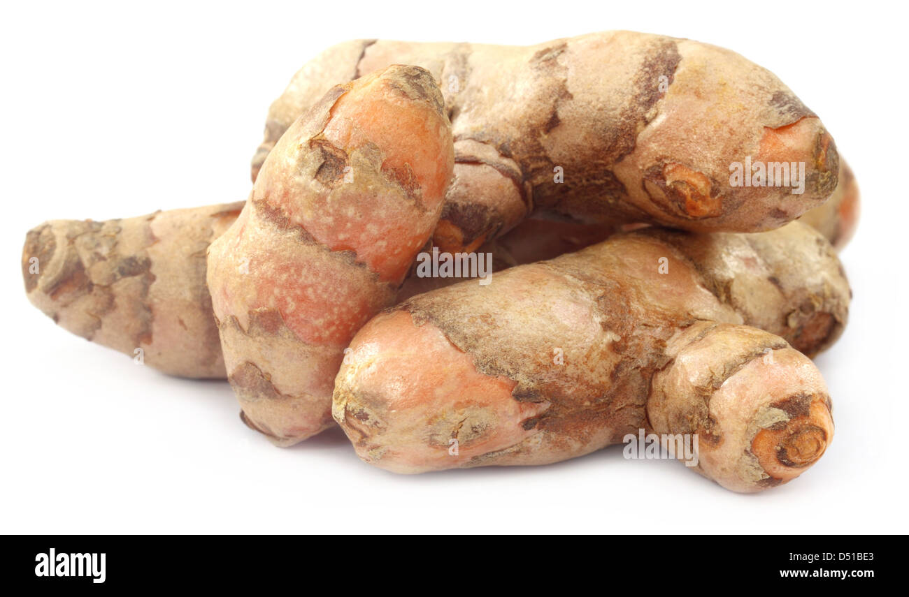 Raw Turmeric over white background Stock Photo - Alamy