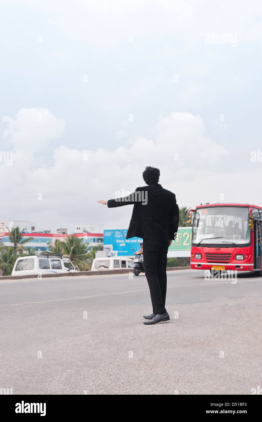 Hailing bus hi-res stock photography and images - Alamy