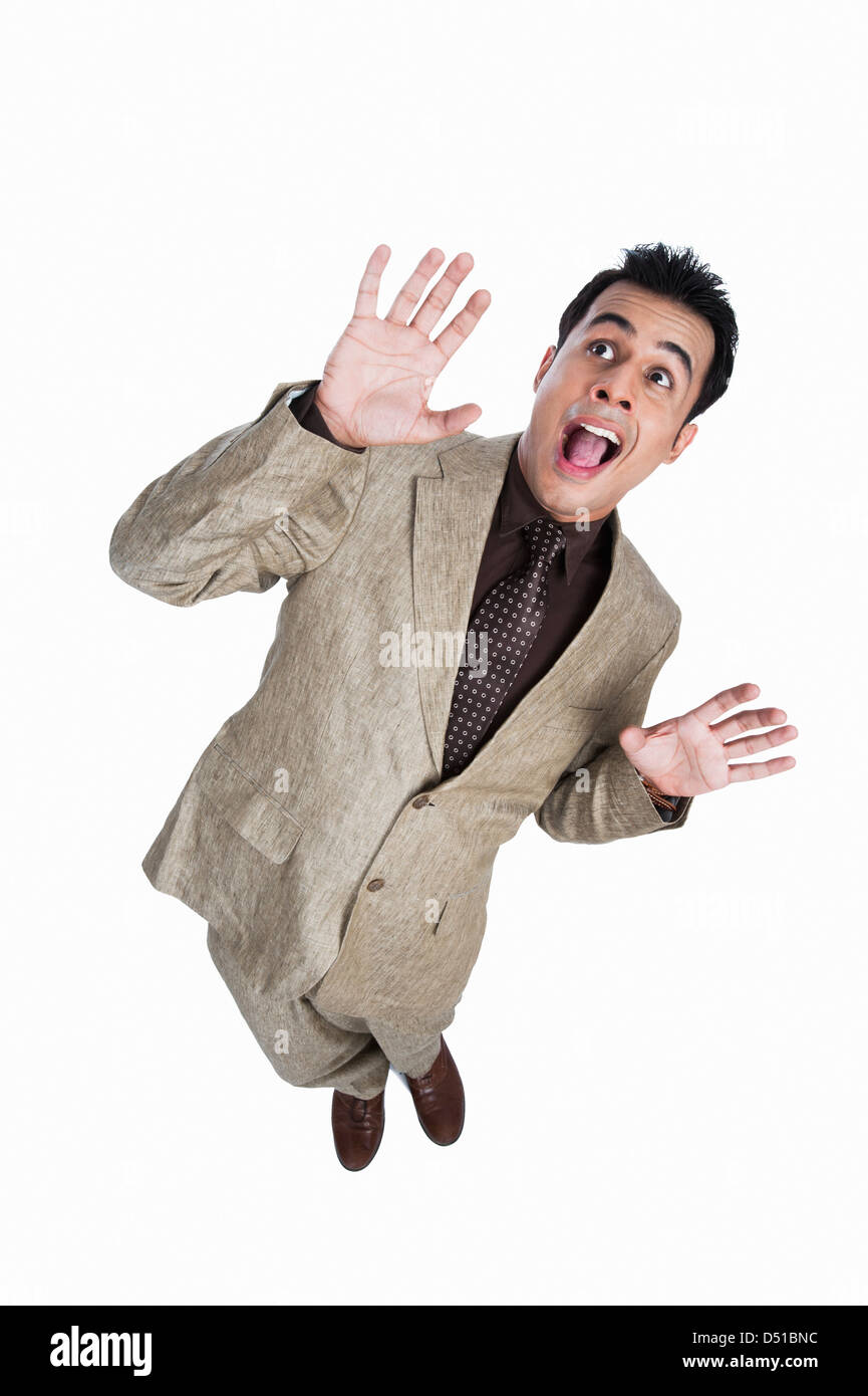 Businessman looking surprised Stock Photo - Alamy