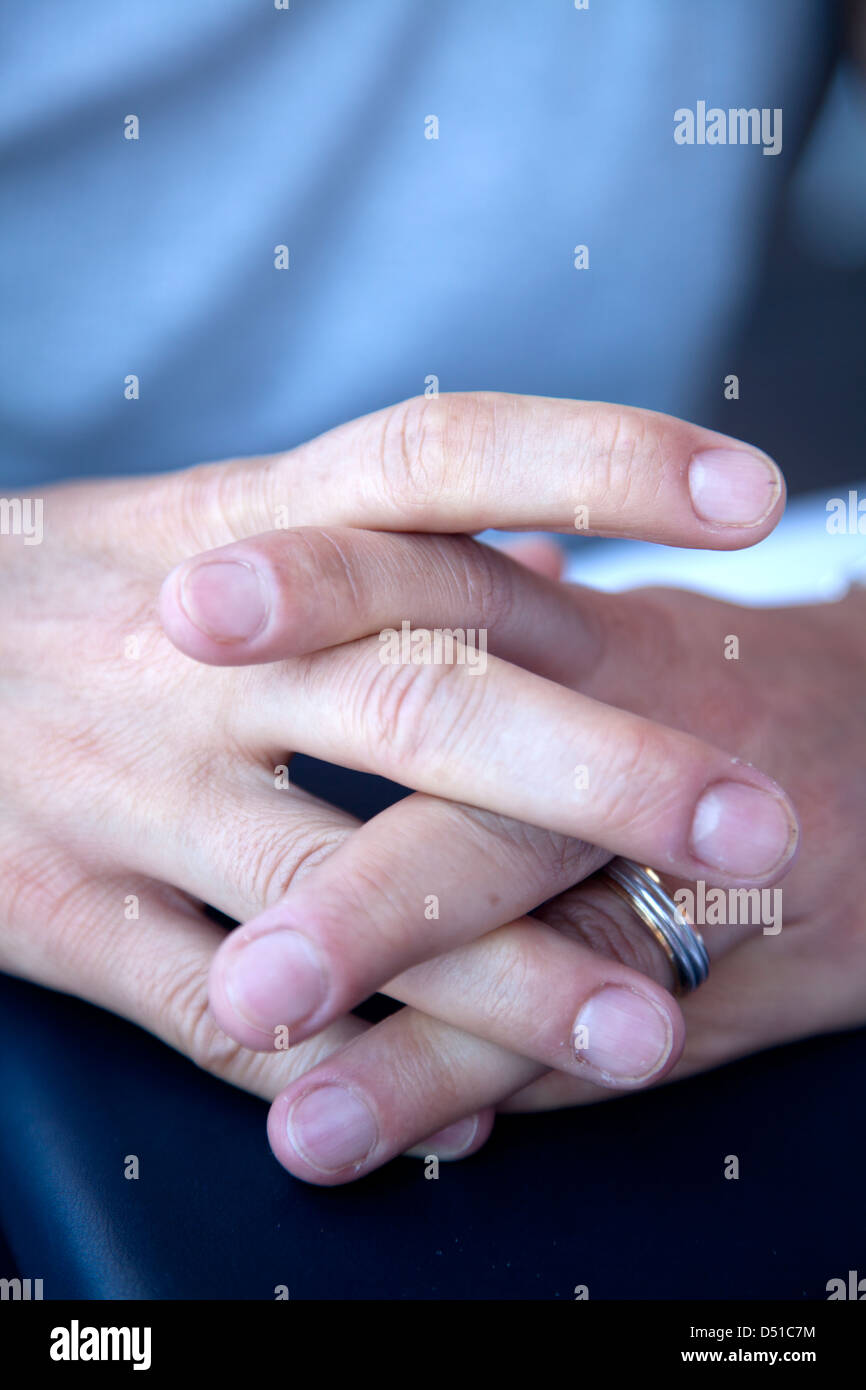 Clasp fingers hi-res stock photography and images - Alamy