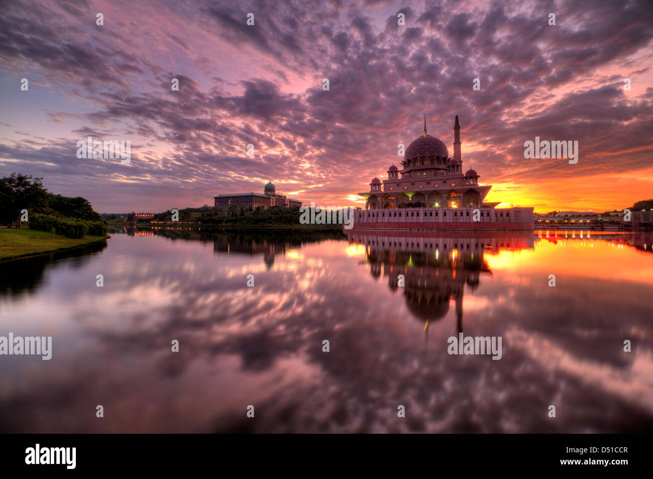 View of Putra Mosque beside Putrajaya Lake during morning Stock Photo ...