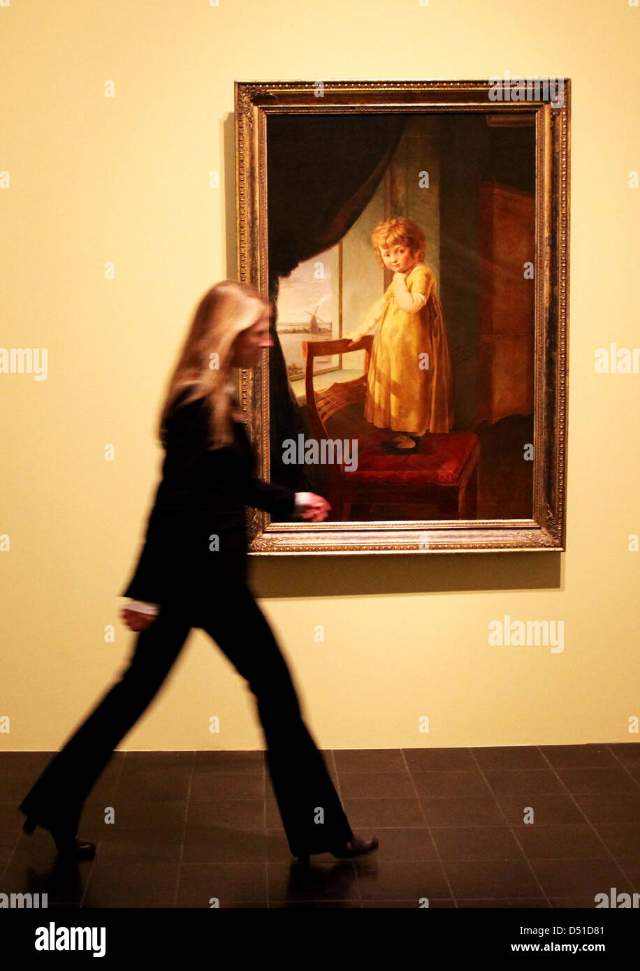 A visitor walks past the painting 'Die kleine Perthes' (The Little ...
