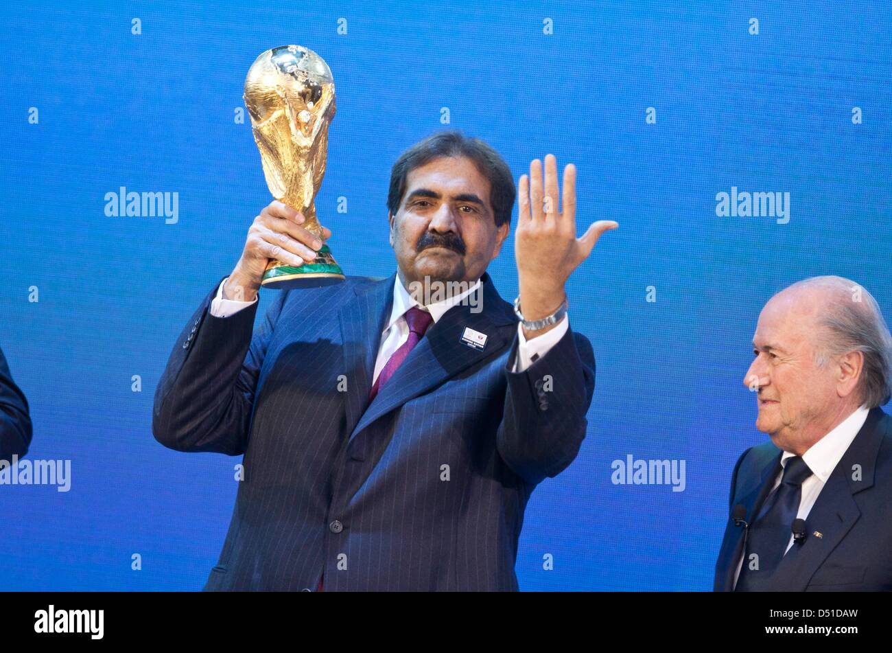 Sheikh Hamad bin Khalifa Al-Thani, Emir of Qatar (L), accepts the World ...