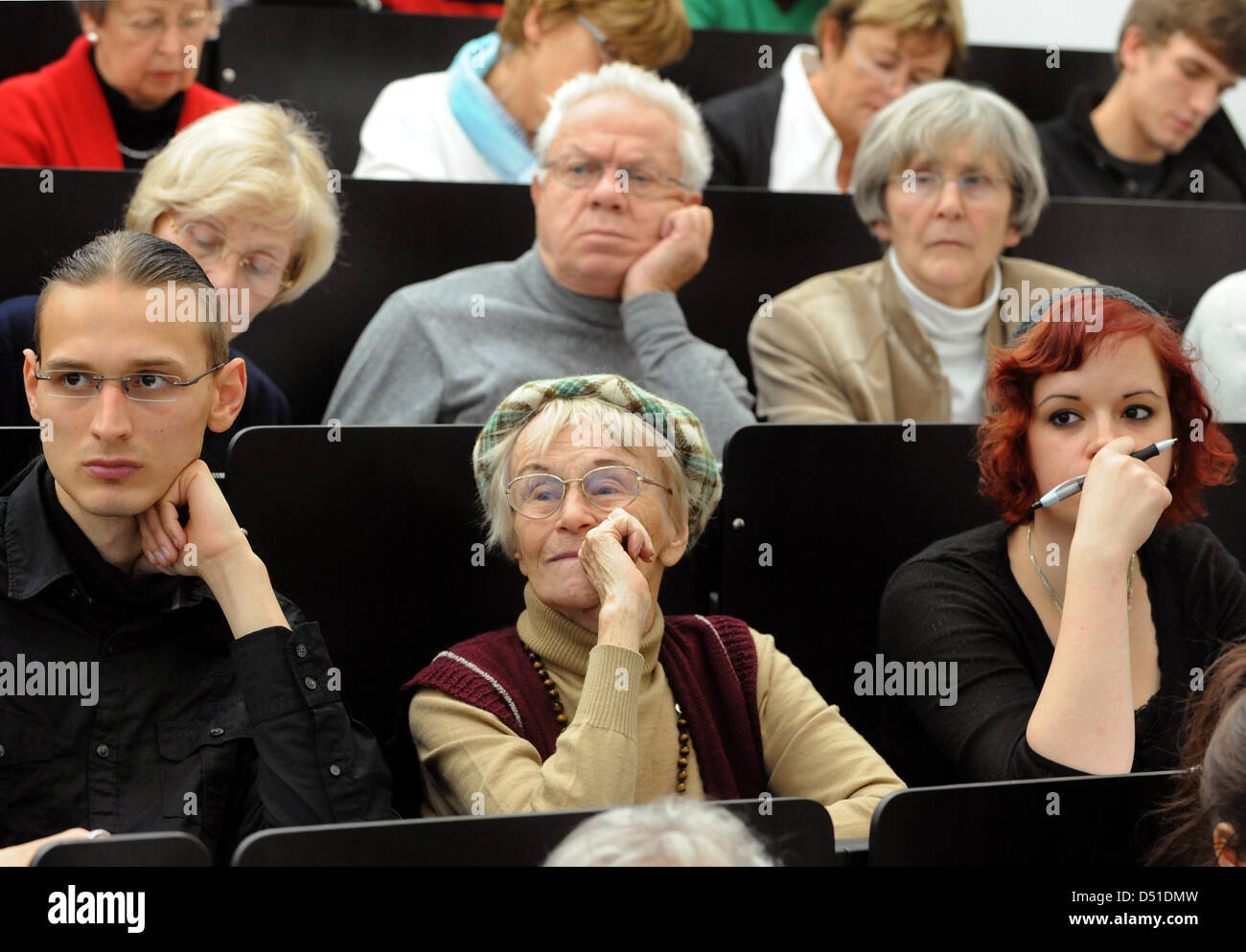Young students sit next to the 88-years-old guest auditor Dr. Helga ...