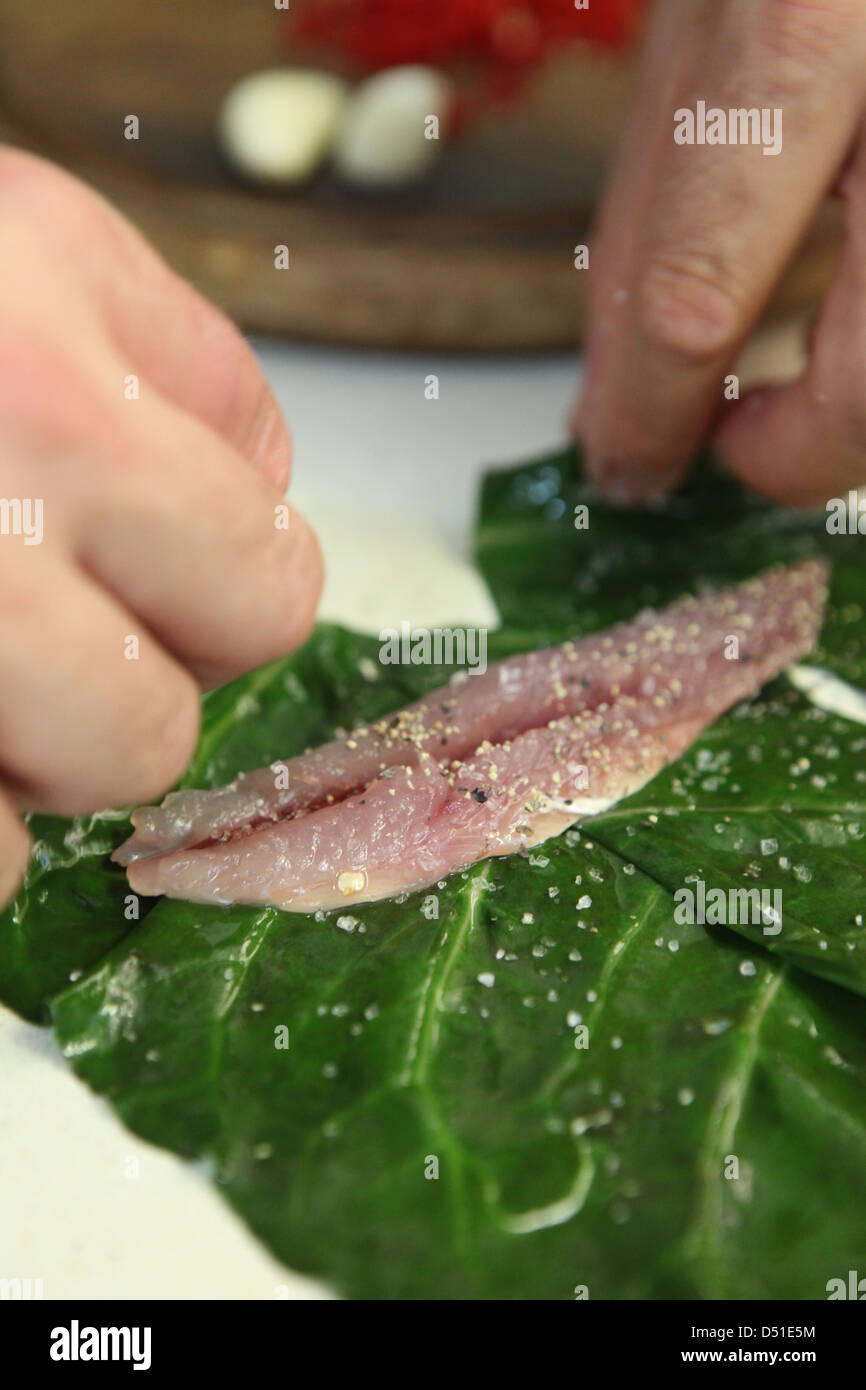 Mackerel fish fillet wrapped in chard leaves Stock Photo - Alamy
