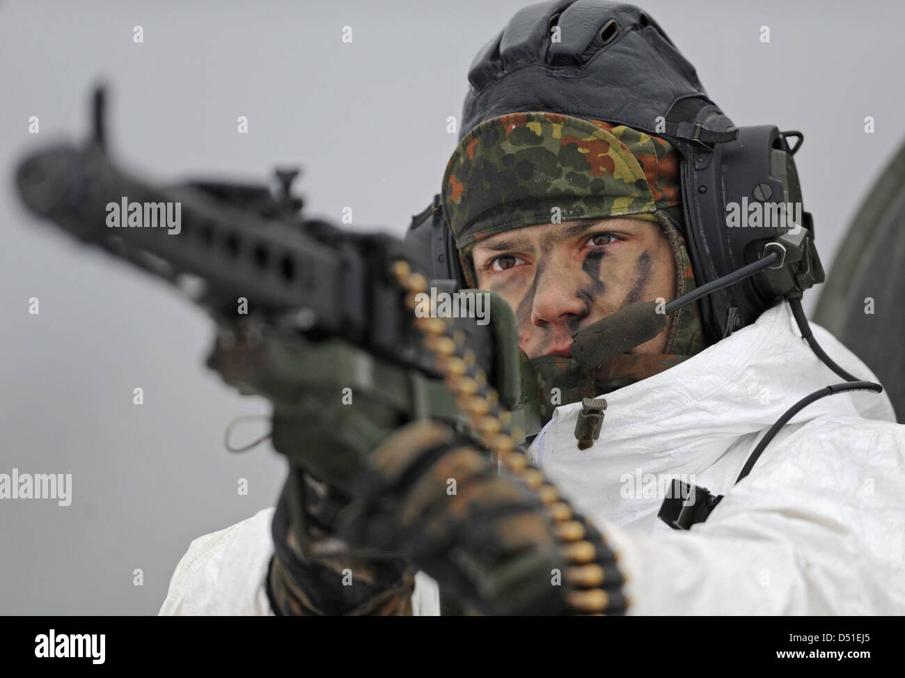 A soldier of the German-French Brigade is pictured on a troop carrier ...