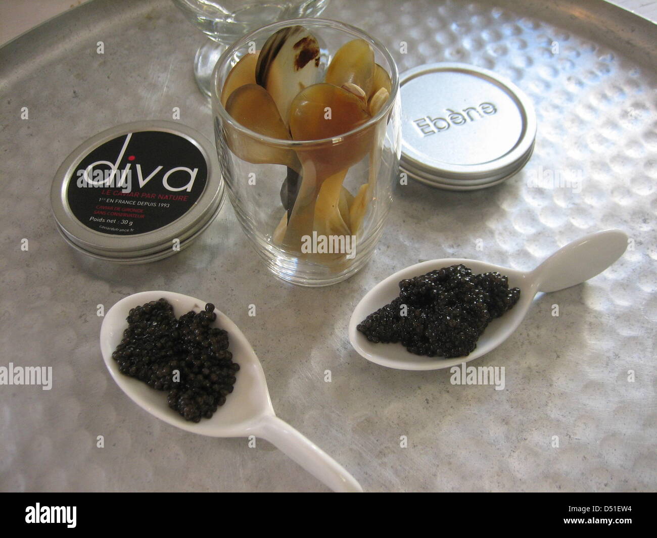 Caviar is layd out for a tasting at the sturgeon farm Le Moulin de la ...