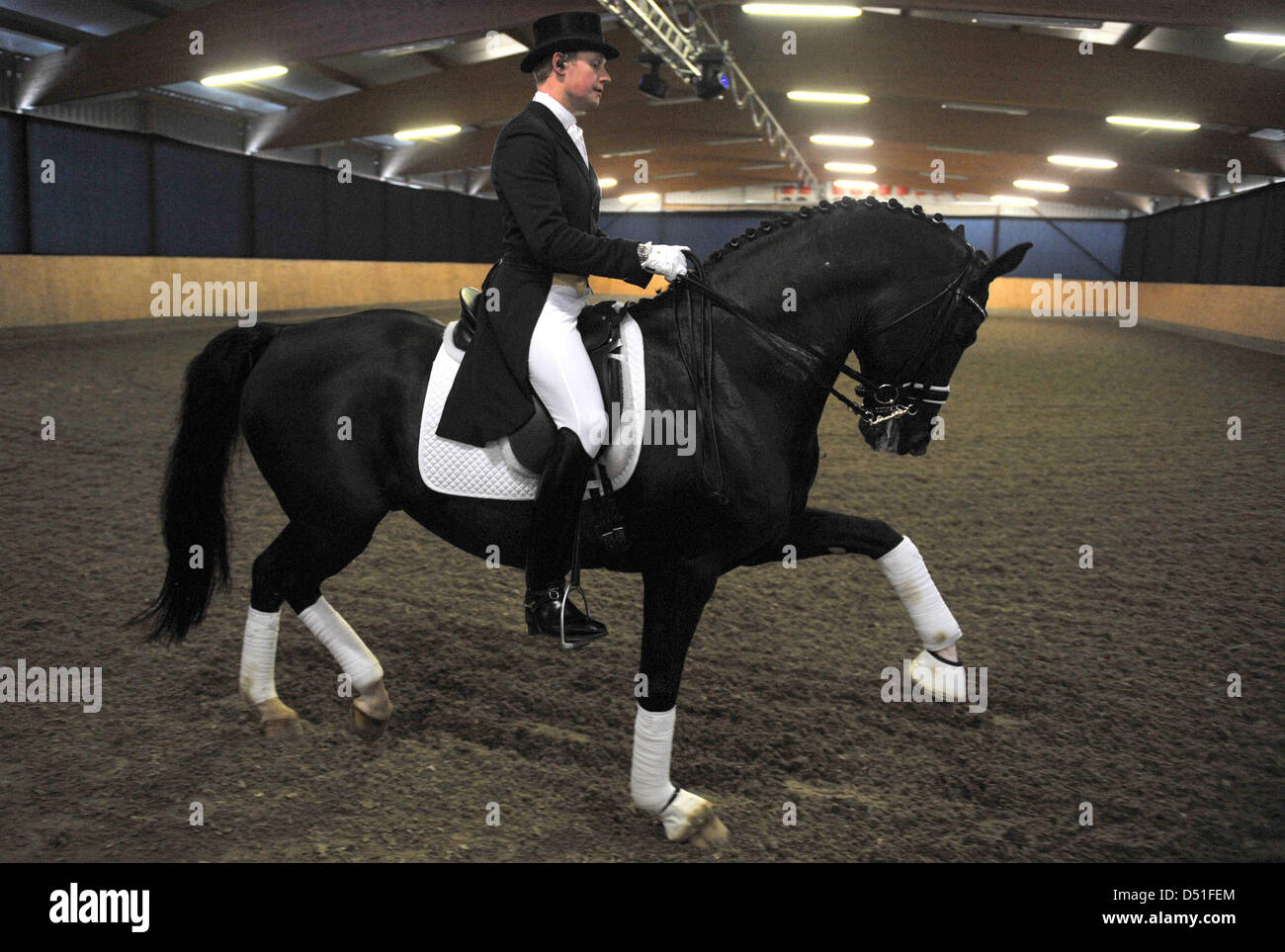 Germany's Matthias-Alexander Rath rides the champion horse 'Totilas' in ...