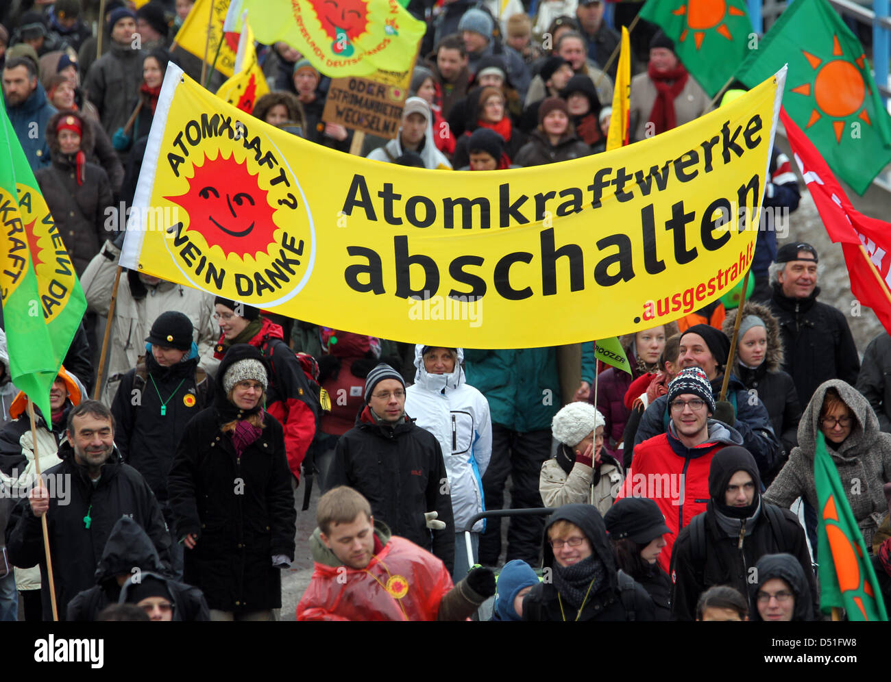 Acitivists protest against nuclear waste transports with a banner in ...