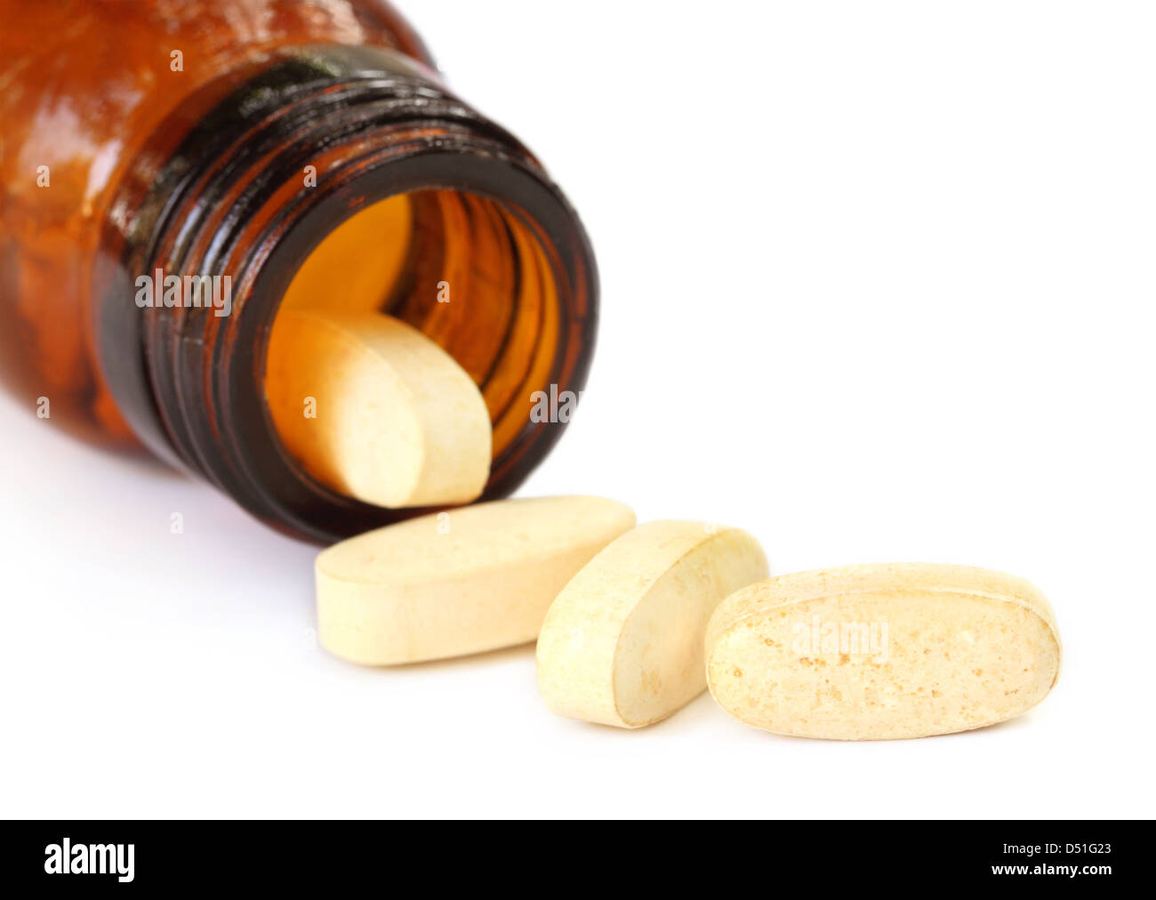 Tablets over white background Stock Photo - Alamy