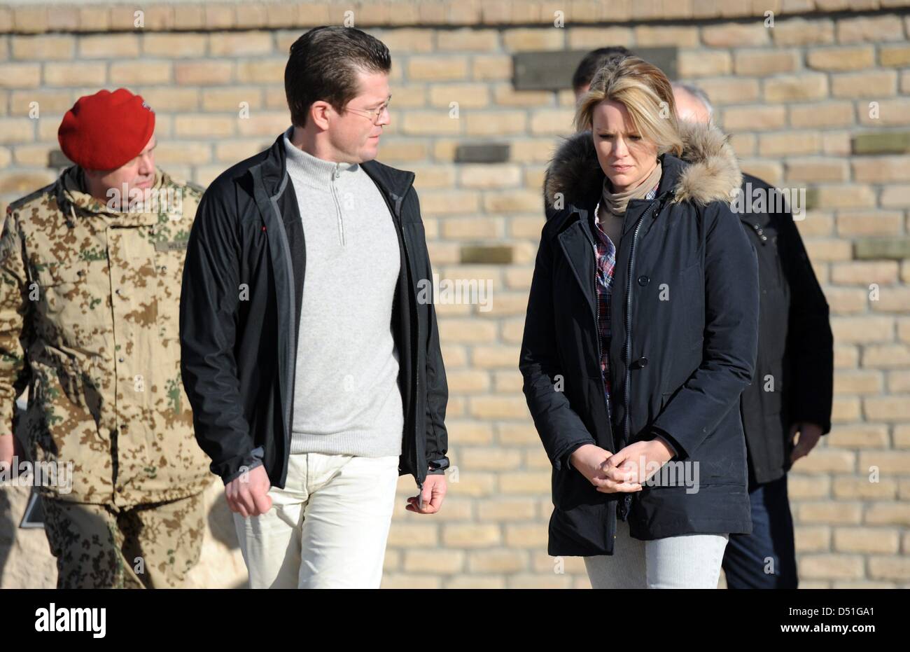 German Defence Minister Karl-Theodor zu Guttenberg and his wife ...