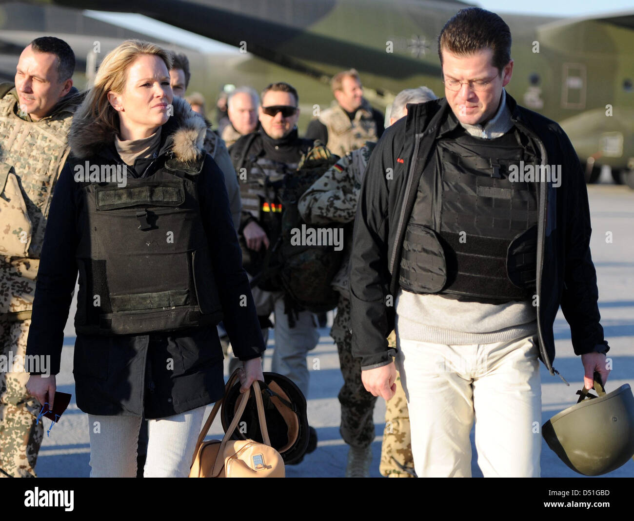 German Defence Minister Karl-Theodor zu Guttenberg and his wife ...