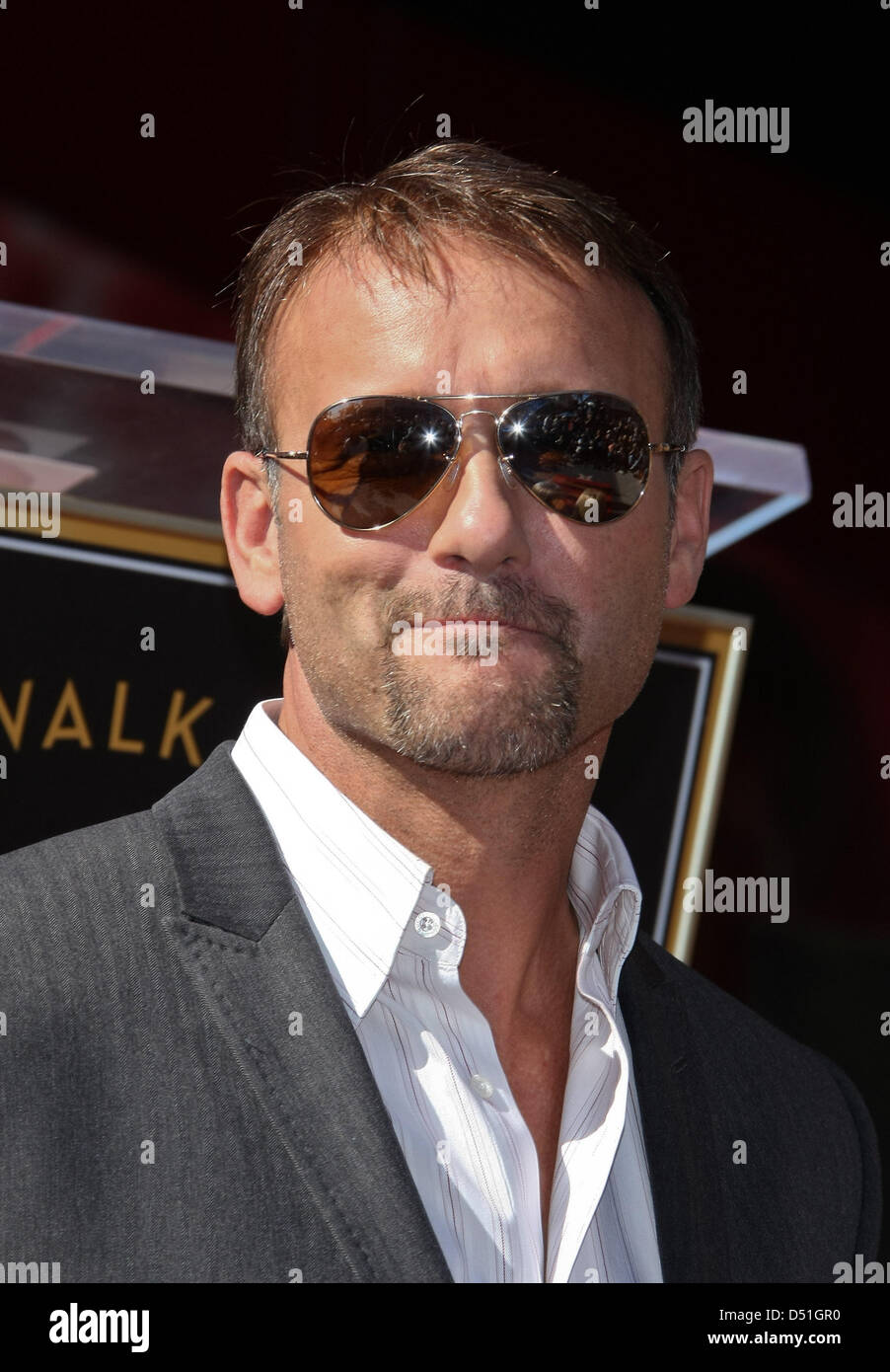 US country singer Tim McGraw poses during a ceremony on the Hollywood ...