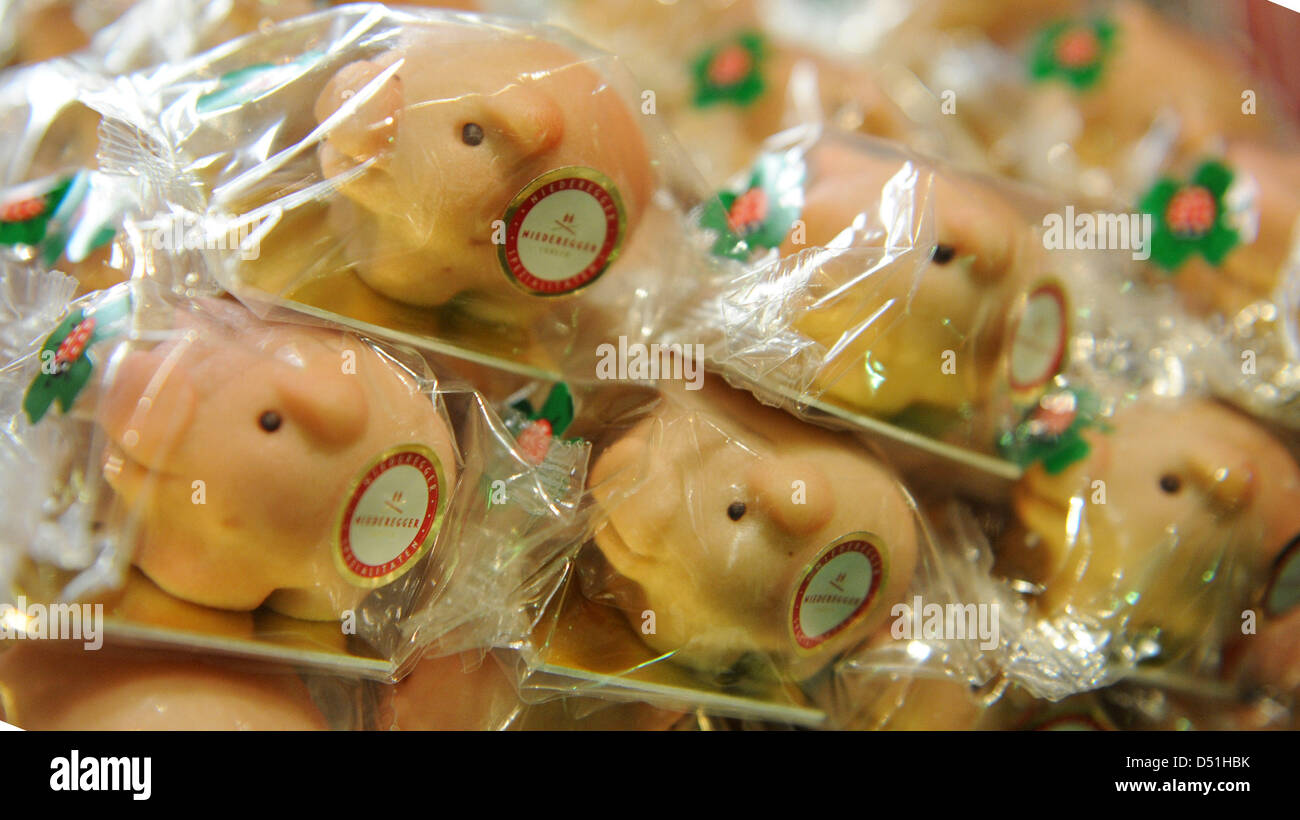 Pigs made of marzipan are stacked in the shop 'Niederegger-Marzipan' in Luebeck, Germany, 15 ...