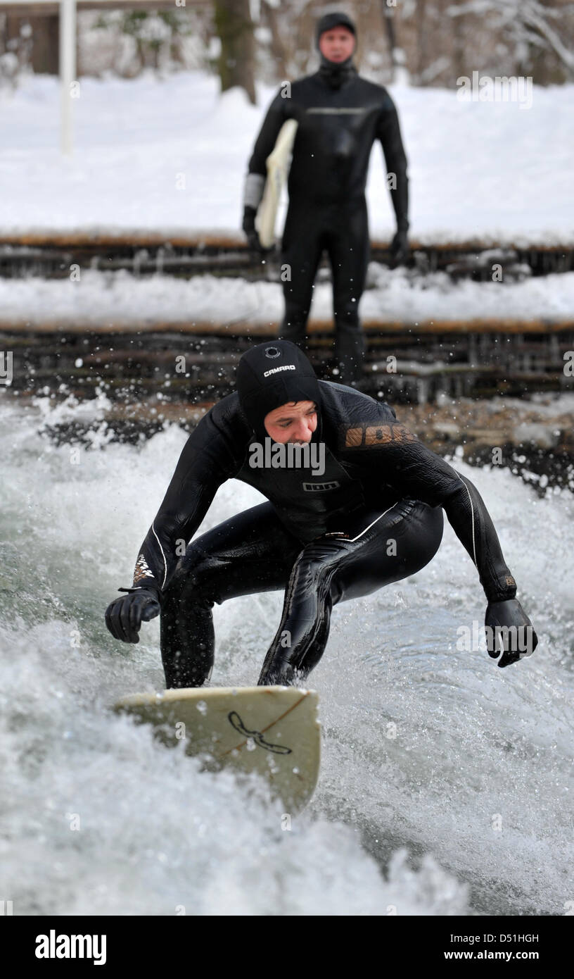 Two young men surf in the Icestream at temeratures around minus six ...