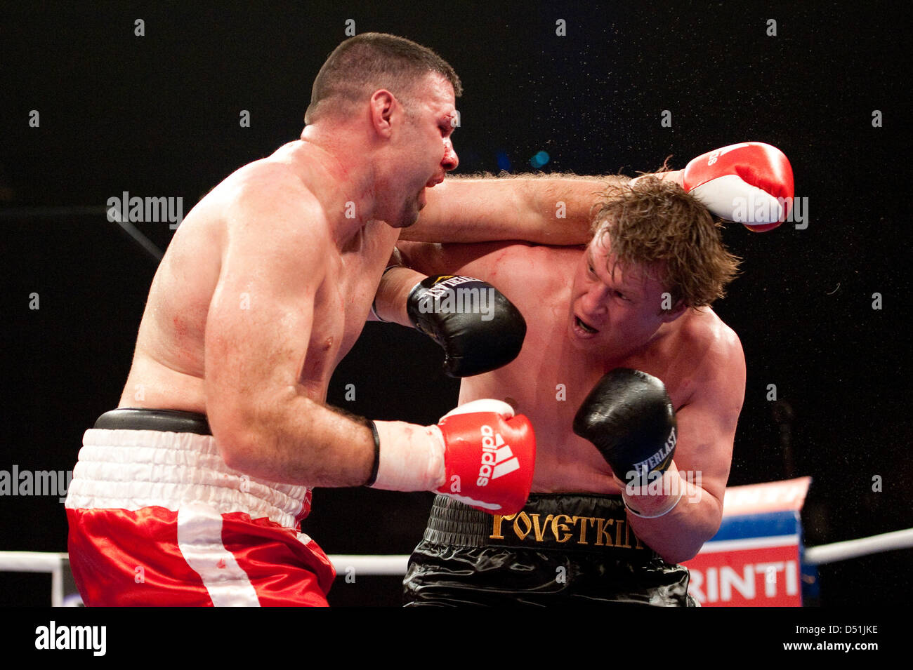 Russian boxer Alexander Povetkin (R) and US boxer Nicolai Firtha fight ...