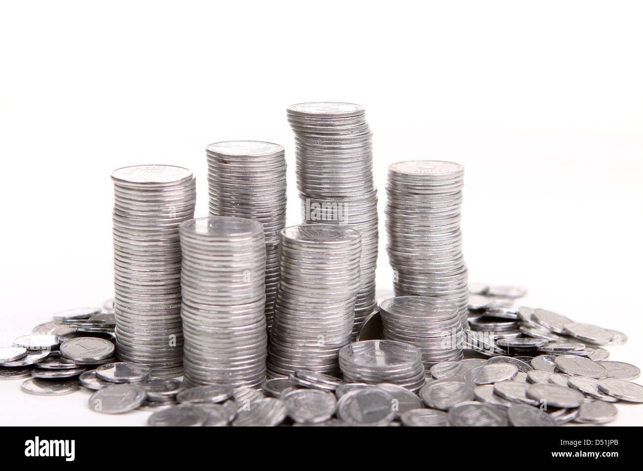 stack of coins isolated on a white background Stock Photo - Alamy