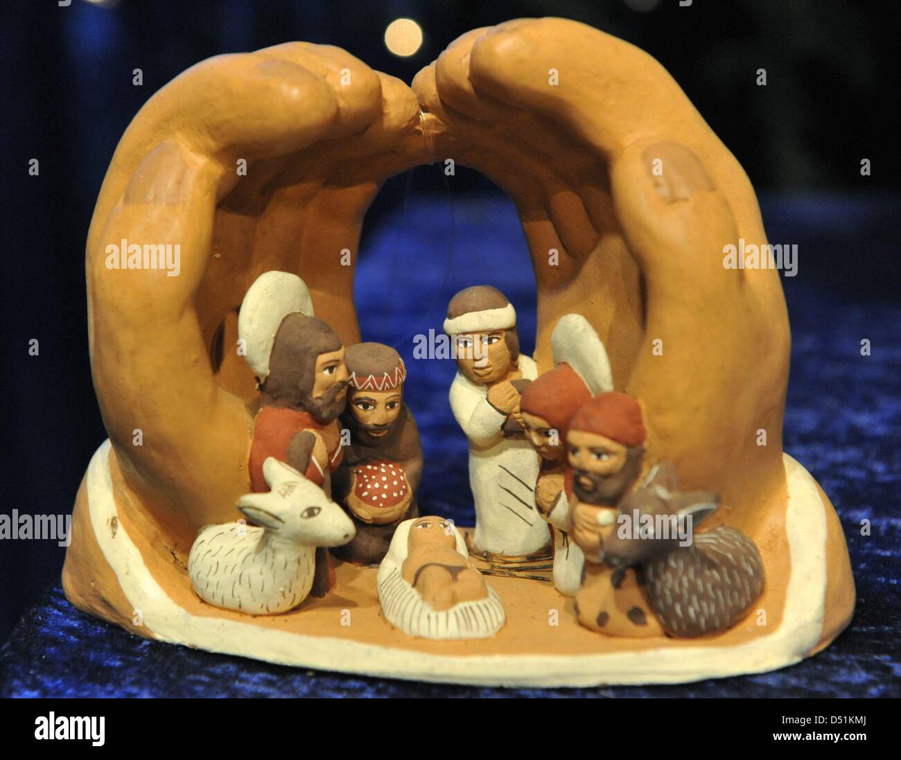 A traditional nativity scene from Peru is on display at the exhibition ...