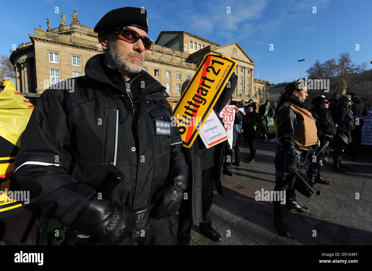 Protesters dressed as police officers march in front Baden-Wuerttemberg ...