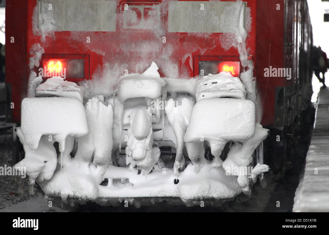 A snowed over German railway locomotive sits in the central train ...