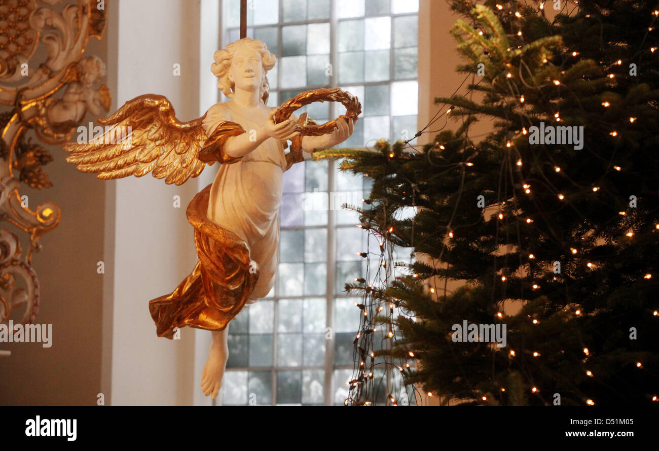 An angel figurine hangs in the Christianskirche church in Hamburg ...
