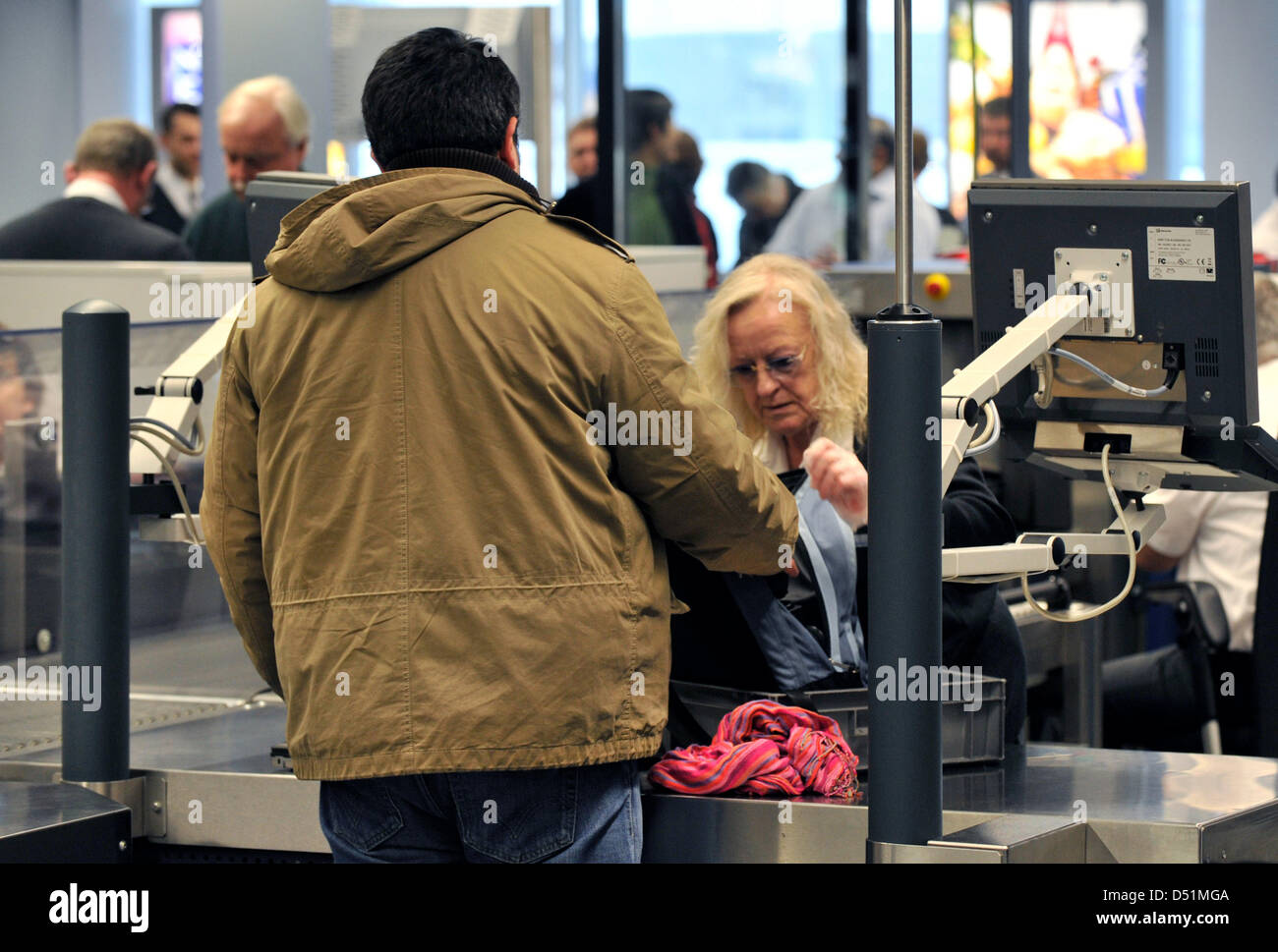 A file picture dated 2 February 2010 shows passengers during a security ...