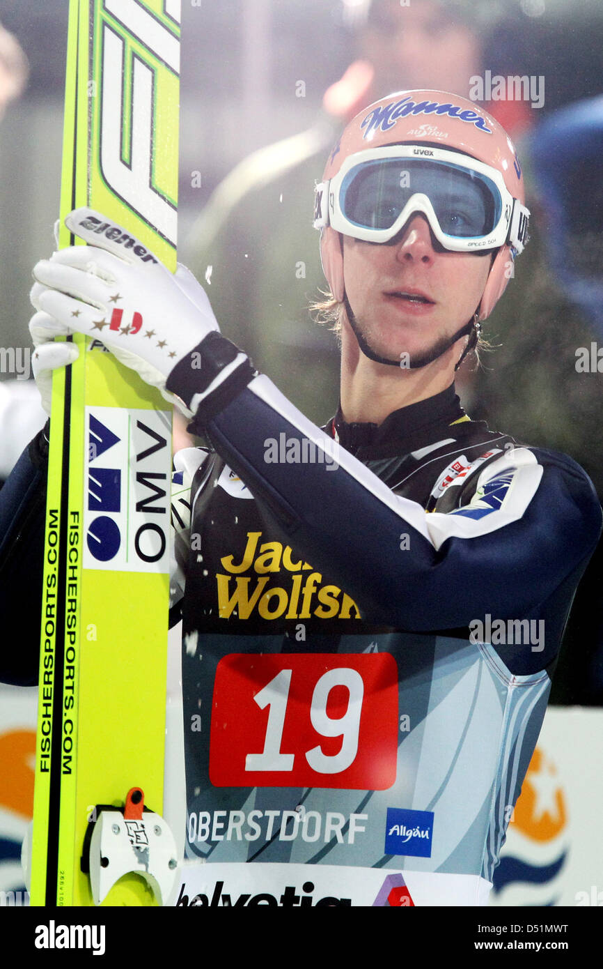 Austrian ski jumper Martin Koch cheers after the finals of the 59th ...