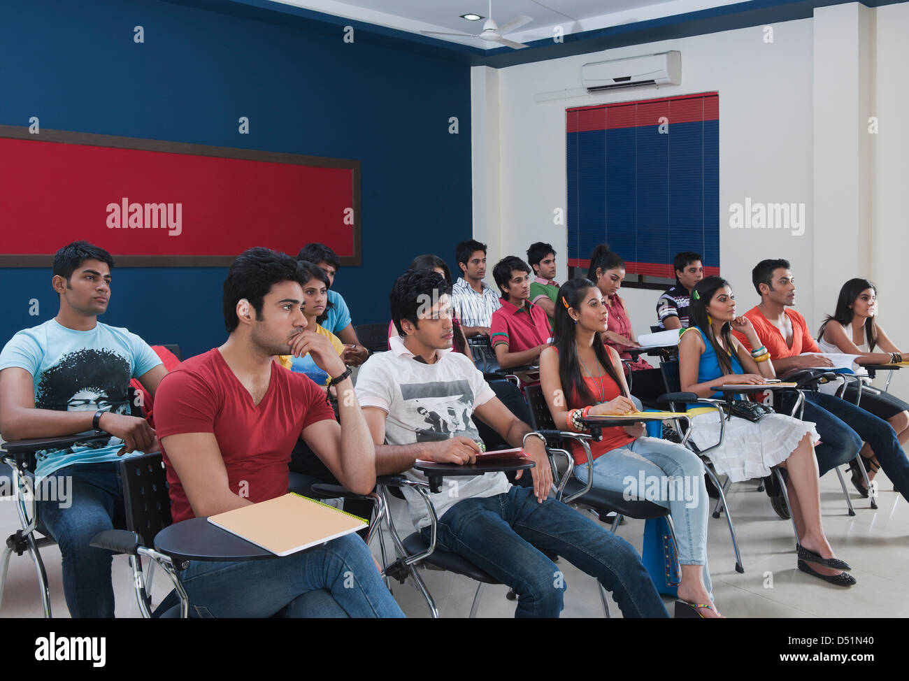 University students studying in a classroom Stock Photo - Alamy