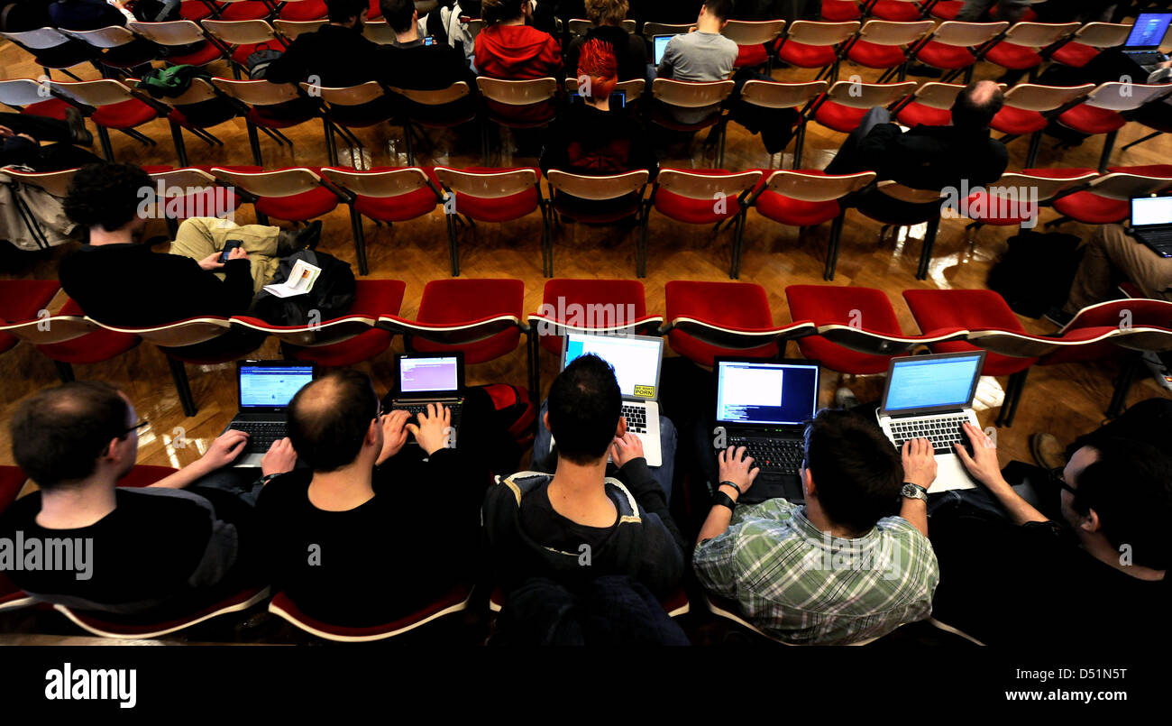 Participans work on laptops during the 27th convention of the Chaos ...