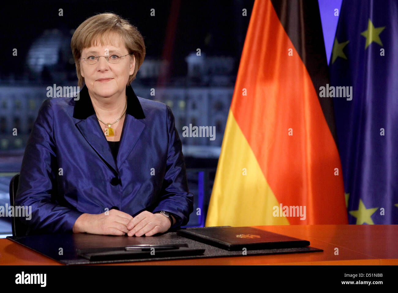 German Chancellor Angela Merkel poses for photographers after her ...