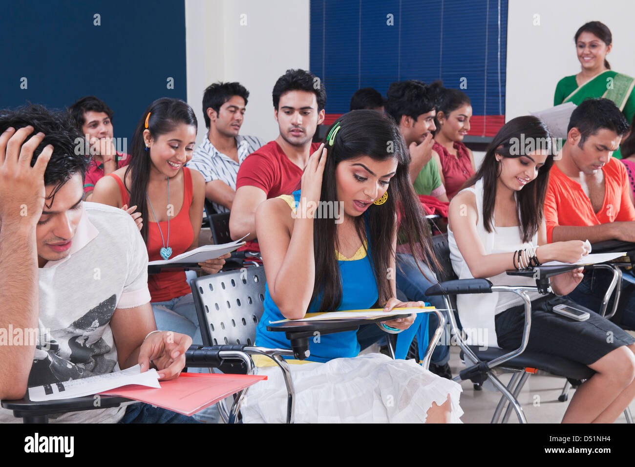 University students in an examination hall Stock Photo - Alamy