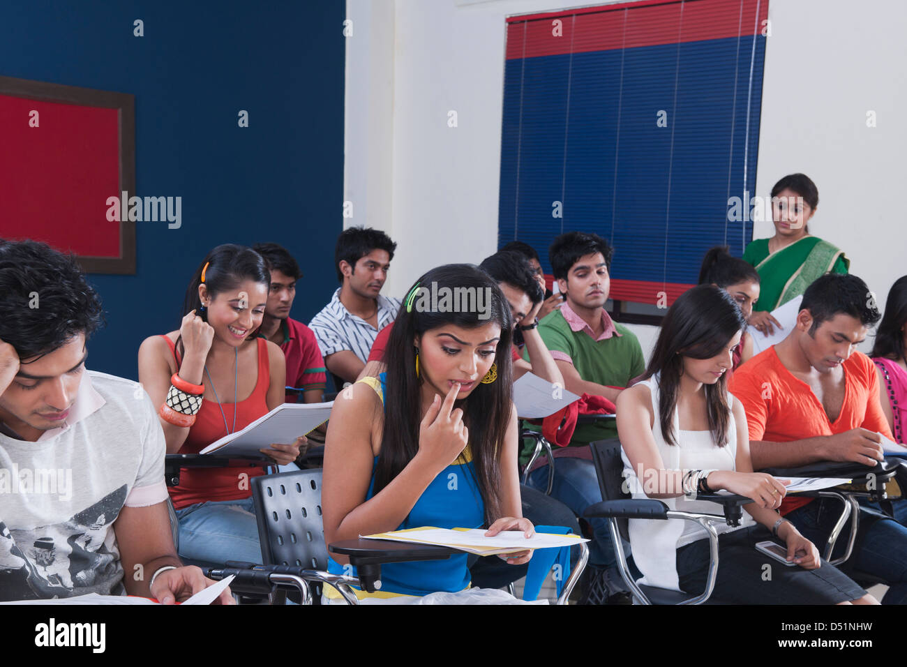 University students in an exam hall Stock Photo - Alamy