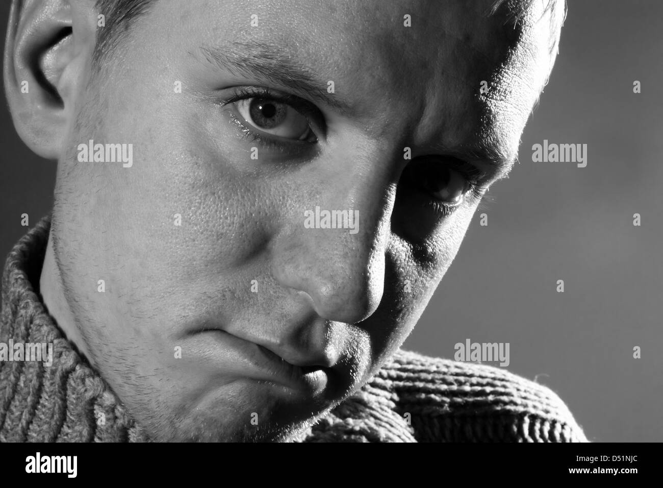 Young man staring camera hi-res stock photography and images - Alamy