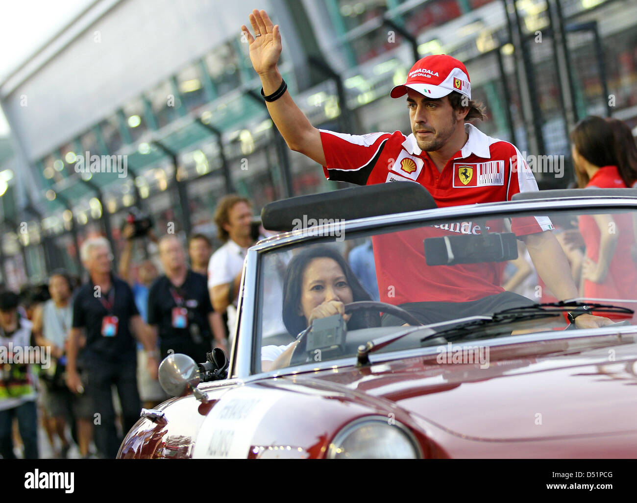 Spanish formula one driver Fernando Alonso of Team Ferrari stands ...