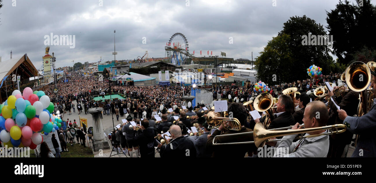 Musicians play at the traditional concert of the Oktoberfest marching ...