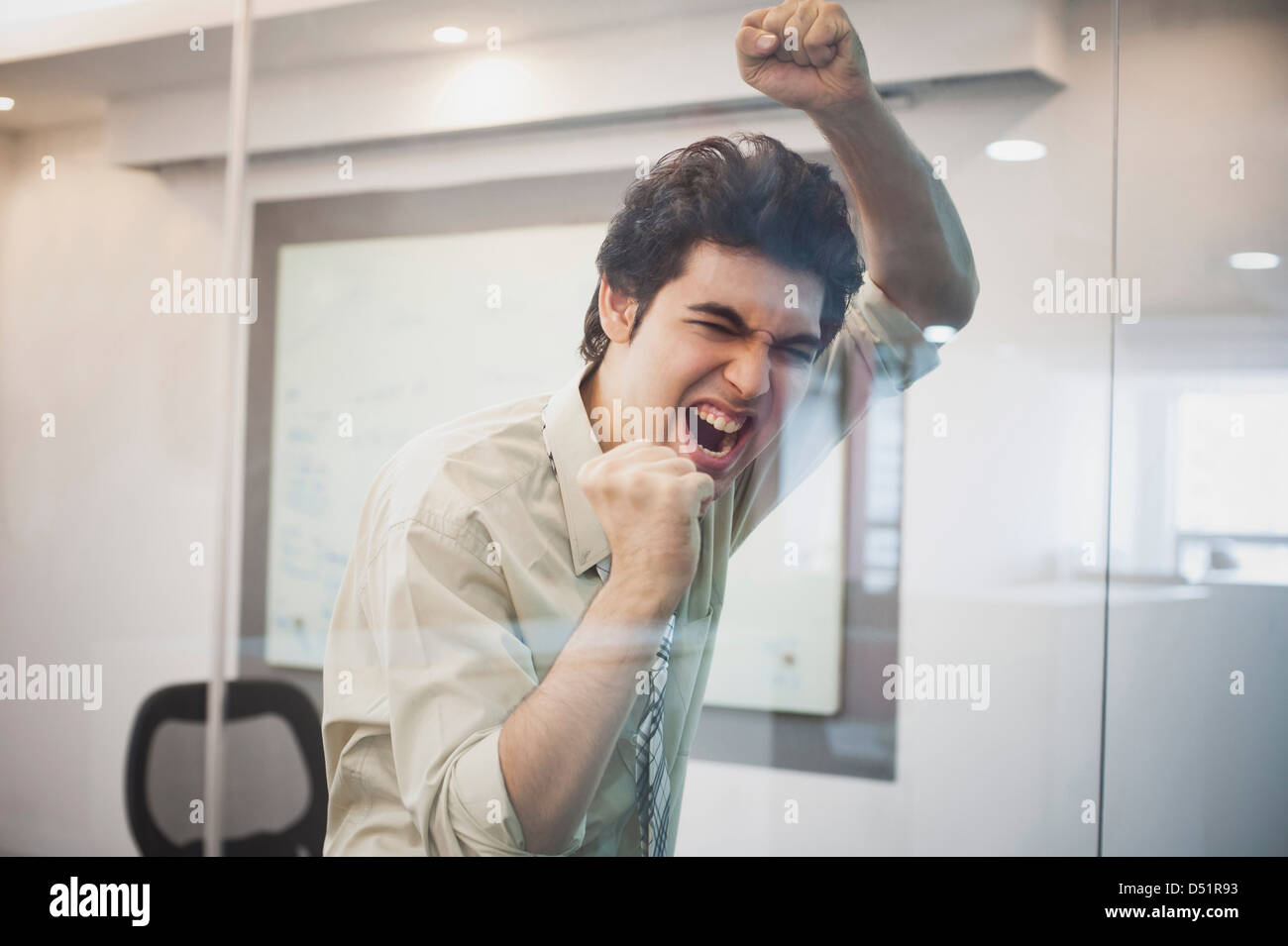Man standing behind closed door hi-res stock photography and images - Alamy