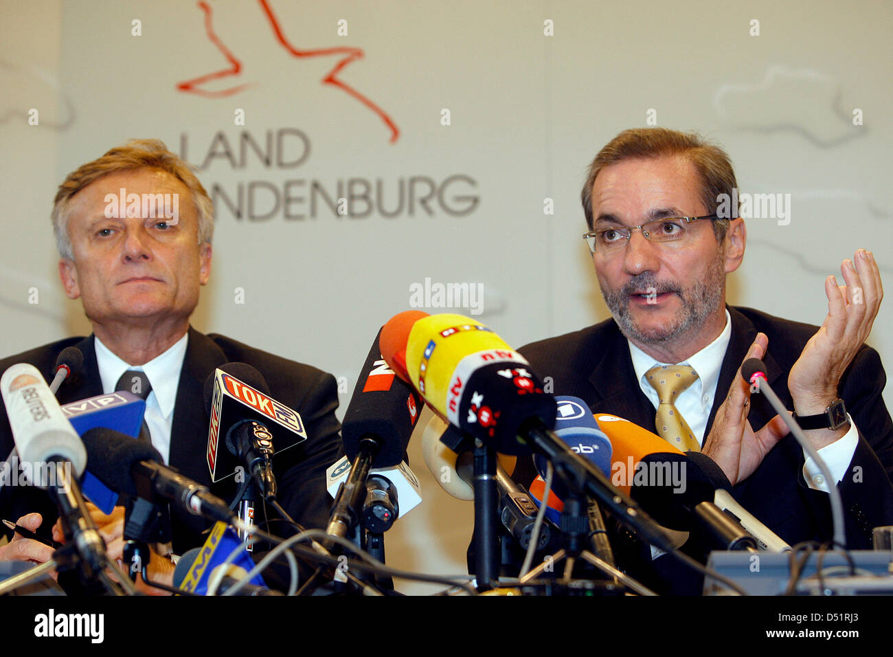 Federal state Brandenburg's Prime Minister Matthias Platzeck (R) and ...