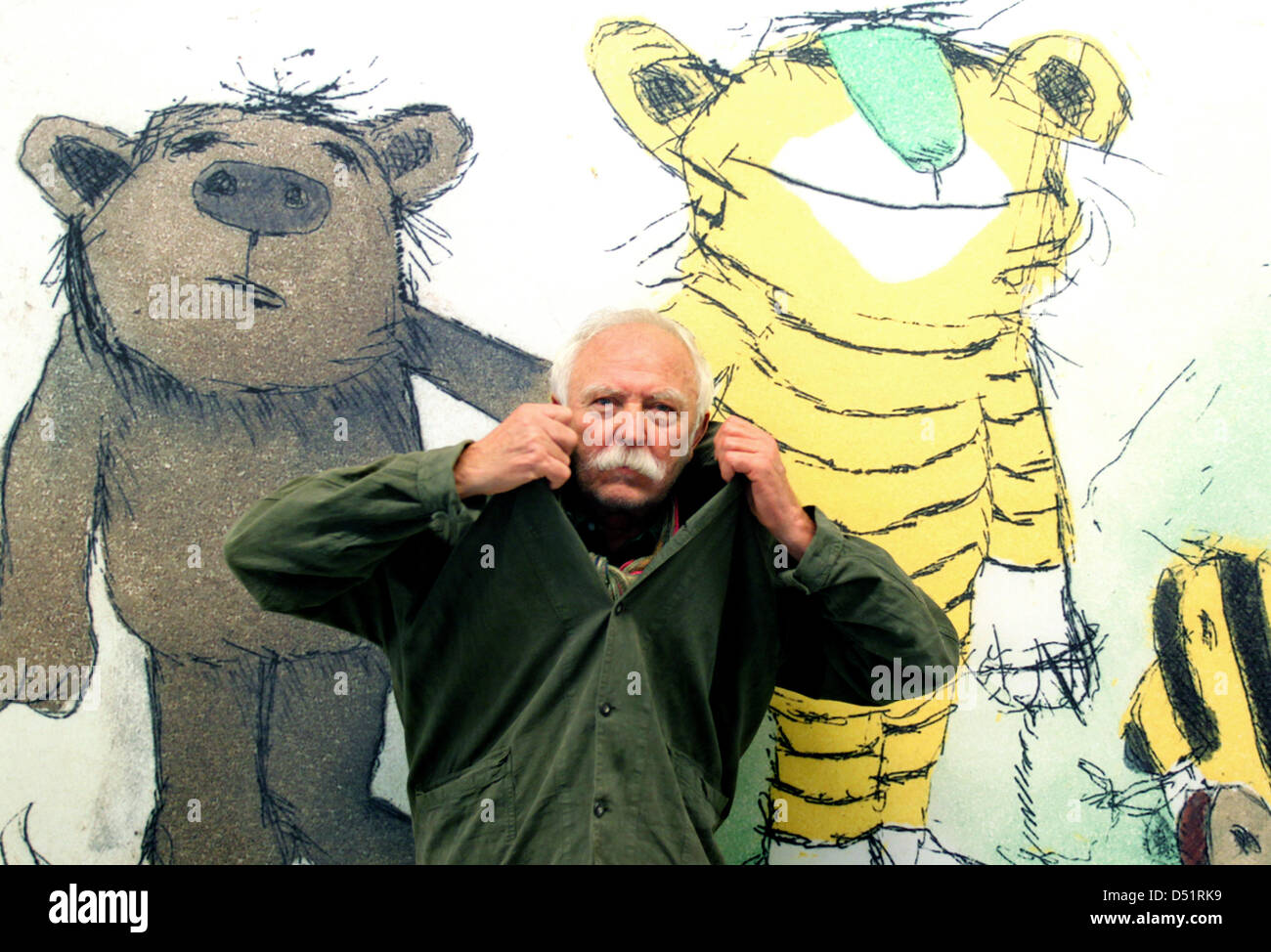 German artist and children's book author Janosch poses in front of his ...