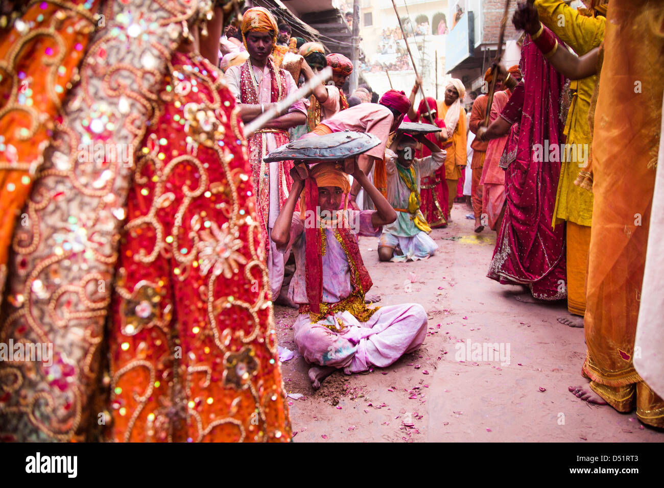 Lath mar Holi, women ritually fight off advances by men from ...
