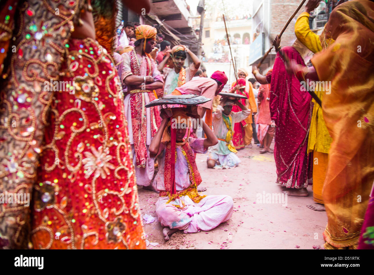 Lath mar Holi, women ritually fight off advances by men from ...