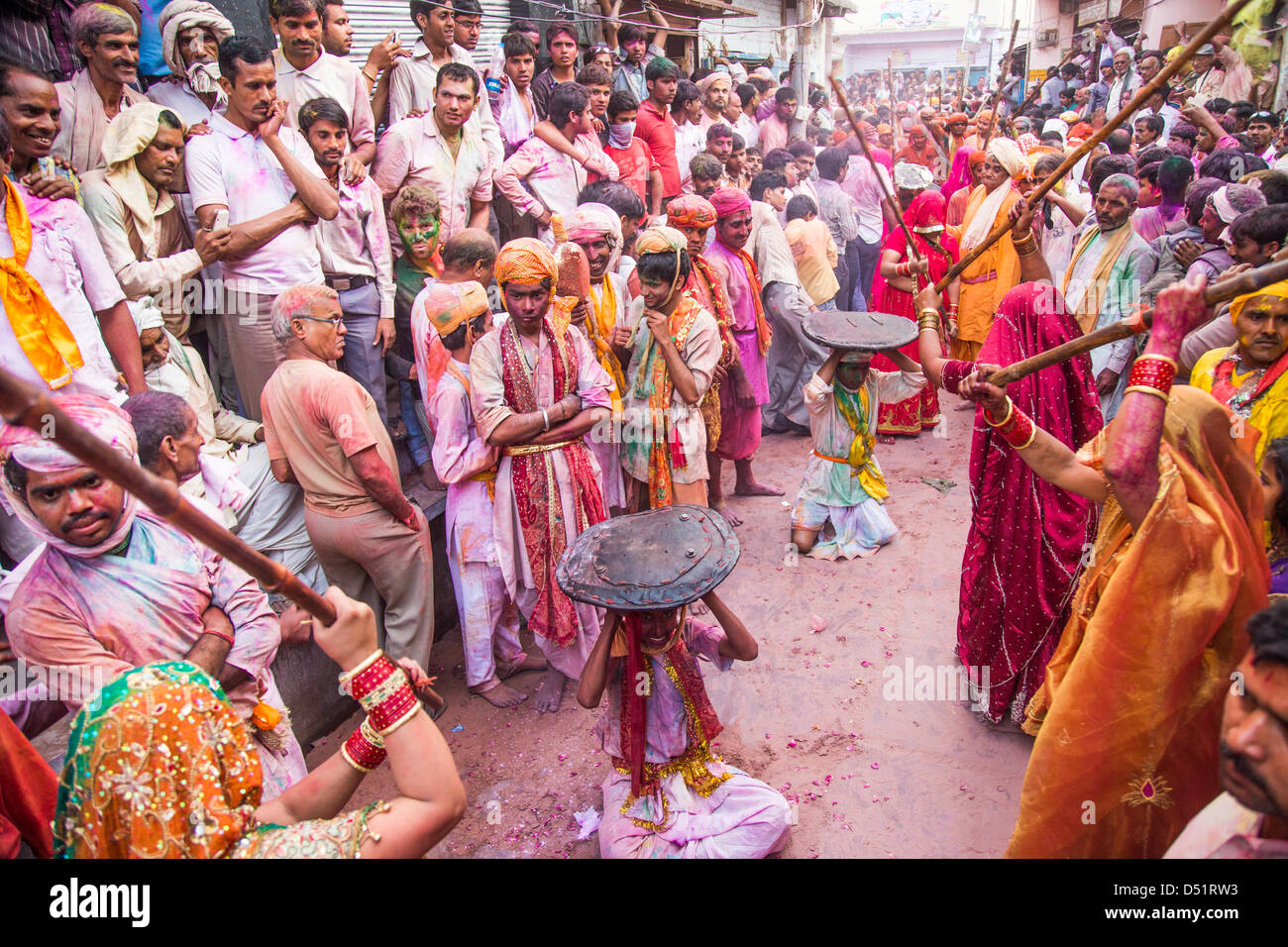 Lath mar Holi, women ritually fight off advances by men from ...